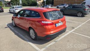 Orange Ford Focus 2013 in Riga, with an engine capacity of 2.00 L and mileage of 234 thousand km for 3450 €, photo 6 on AUTOMOTO.COM.LV