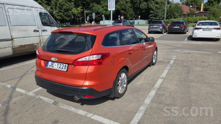 Oranžs Ford Focus 2013 Rīga, ar dzinēja tilpumu 2.00 L un nobraukumu 234 tūkst. km par 3450 €, foto 5 vietnē AUTOMOTO.COM.LV