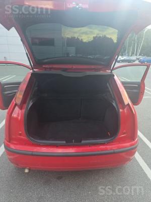 Red Ford Focus 2003 in Riga, with an engine capacity of 1.80 L and mileage of 299 thousand km for 700 €, photo 7 on AUTOMOTO.COM.LV