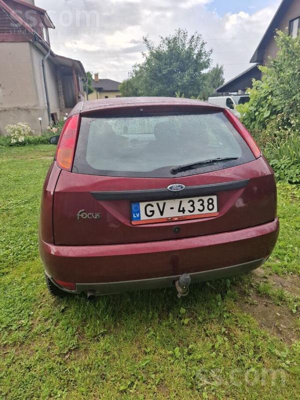 Sarkans Ford Focus 1999 Saldus, ar dzinēja tilpumu 1.60 L un nobraukumu 189 tūkst. km par 450 €, foto 5 vietnē AUTOMOTO.COM.LV