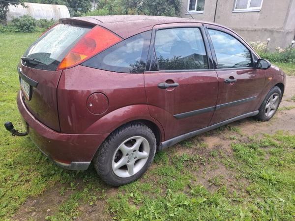 Sarkans Ford Focus 1999 Saldus, ar dzinēja tilpumu 1.60 L un nobraukumu 189 tūkst. km par 450 €, foto 6 vietnē AUTOMOTO.COM.LV