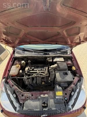 Red Ford Focus 2002 in Riga, with an engine capacity of 1.60 L and mileage of 130 thousand km for 500 €, photo  on AUTOMOTO.COM.LV