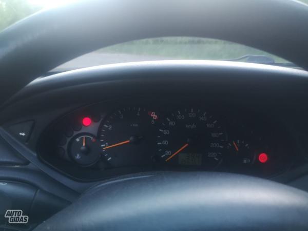 Sarkans Ford Focus 2003 Jonava, ar dzinēja tilpumu 1.80 L un nobraukumu 258 tūkst. km par 430 €, foto 1 vietnē AUTOMOTO.COM.LV