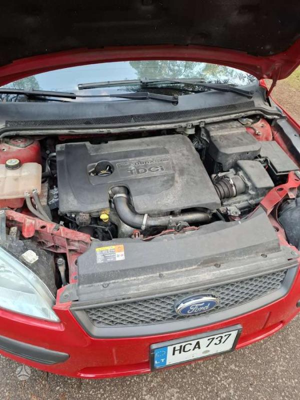 Red Ford Focus 2006 in Kaunas, with an engine capacity of 1.56 L and mileage of 184 thousand km for 875 €, photo 10 on AUTOMOTO.COM.LV