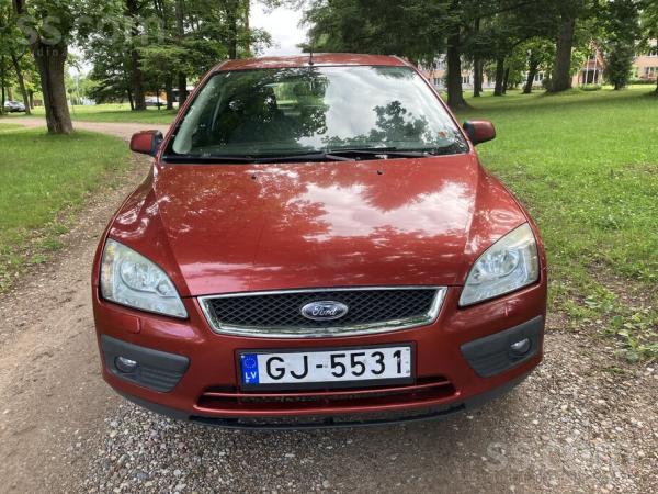 Red Ford Focus 2007 in Jelgava, with an engine capacity of 1.60 L and mileage of 301 thousand km for 1290 €, photo 2 on AUTOMOTO.COM.LV