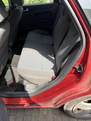 Red Ford Focus 2007 in Panevezys, with an engine capacity of 1.60 L and mileage of 131 thousand km for 1800 €, photo 14 on AUTOMOTO.COM.LV