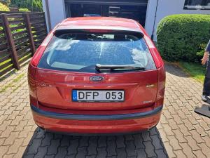 Red Ford Focus 2007 in Vilnius, with an engine capacity of 1.56 L and mileage of 117 thousand km for 1700 €, photo 4 on AUTOMOTO.COM.LV