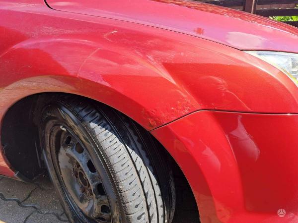 Red Ford Focus 2007 in Vilnius, with an engine capacity of 1.56 L and mileage of 117 thousand km for 1700 €, photo 9 on AUTOMOTO.COM.LV
