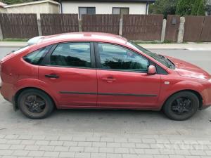 Red Ford Focus 2007 in Riga, with an engine capacity of 1.40 L and mileage of 186 thousand km for 770 €, photo 3 on AUTOMOTO.COM.LV