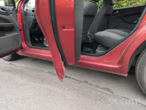 Red Ford Focus 2007 in Riga, with an engine capacity of 1.40 L and mileage of 186 thousand km for 770 €, photo 7 on AUTOMOTO.COM.LV