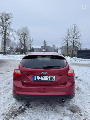 Red Ford Focus 2011 in Vilnius, with an engine capacity of 1.60 L and mileage of 205 thousand km for 2550 €, photo 8 on AUTOMOTO.COM.LV