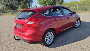 Red Ford Focus 2011 in Marijampole, with an engine capacity of 1.60 L and mileage of 249 thousand km for 3250 €, photo 5 on AUTOMOTO.COM.LV
