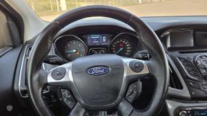 Red Ford Focus 2011 in Marijampole, with an engine capacity of 1.60 L and mileage of 249 thousand km for 3250 €, photo 14 on AUTOMOTO.COM.LV
