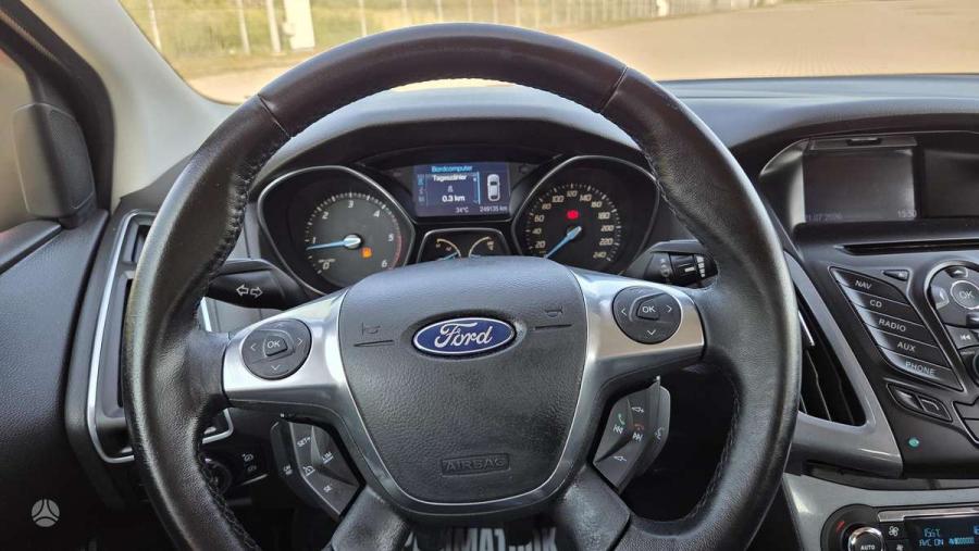 Red Ford Focus 2011 in Marijampole, with an engine capacity of 1.60 L and mileage of 249 thousand km for 3250 €, photo 14 on AUTOMOTO.COM.LV