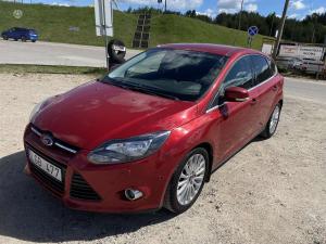 Red Ford Focus 2011 in Vilnius, with an engine capacity of 1.60 L and mileage of 264 thousand km for 2999 €, photo  on AUTOMOTO.COM.LV
