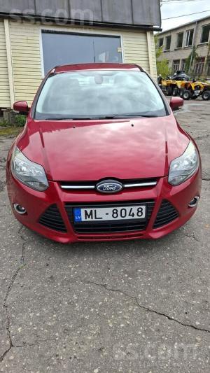 Red Ford Focus 2012 in Riga, with an engine capacity of 1.60 L and mileage of 290 thousand km for 3090 €, photo  on AUTOMOTO.COM.LV