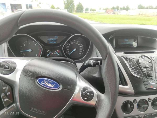 Red Ford Focus 2013 in Siauliai, with an engine capacity of 1.56 L and mileage of 241 thousand km for 3999 €, photo 3 on AUTOMOTO.COM.LV