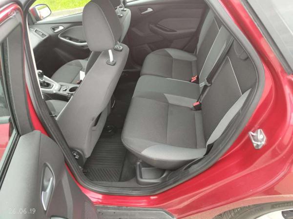 Red Ford Focus 2013 in Siauliai, with an engine capacity of 1.56 L and mileage of 241 thousand km for 3999 €, photo 7 on AUTOMOTO.COM.LV