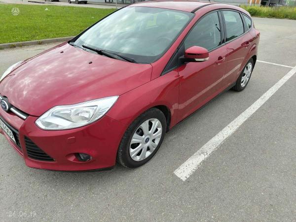 Red Ford Focus 2013 in Siauliai, with an engine capacity of 1.56 L and mileage of 241 thousand km for 3999 €, photo 9 on AUTOMOTO.COM.LV