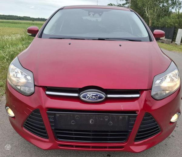 Red Ford Focus 2013 in Pakruojis, with an engine capacity of 1.60 L and mileage of 165 thousand km for 3499 €, photo 2 on AUTOMOTO.COM.LV