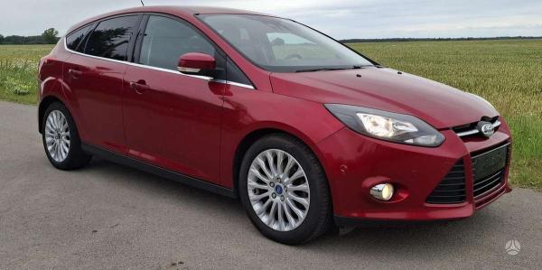 Red Ford Focus 2013 in Pakruojis, with an engine capacity of 1.60 L and mileage of 165 thousand km for 3499 €, photo 7 on AUTOMOTO.COM.LV