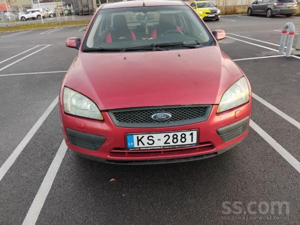 Red Ford Focus 2007 in Riga, with an engine capacity of 1.60 L and mileage of 308 thousand km for 1300 €, photo 1 on AUTOMOTO.COM.LV