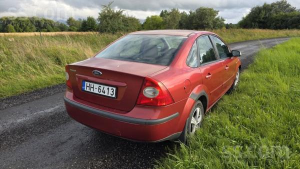Red Ford Focus 2007 in Ventspils, with an engine capacity of 1.60 L and mileage of 293 thousand km for 800 €, photo 5 on AUTOMOTO.COM.LV