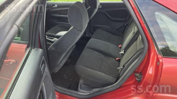 Red Ford Focus 2007 in Ventspils, with an engine capacity of 1.60 L and mileage of 293 thousand km for 800 €, photo 8 on AUTOMOTO.COM.LV
