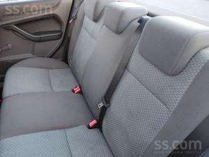 Red Ford Focus 2007 in Riga, with an engine capacity of 1.60 L and mileage of 325 thousand km for 1300 €, photo 8 on AUTOMOTO.COM.LV