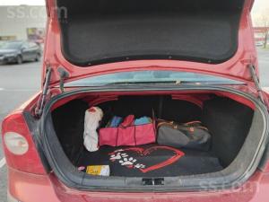 Red Ford Focus 2007 in Riga, with an engine capacity of 1.60 L and mileage of 325 thousand km for 1300 €, photo 9 on AUTOMOTO.COM.LV