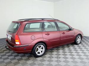 Red Ford Focus 2003 in Tallinn, with an engine capacity of 1.80 L and mileage of 179 thousand km for 1299 €, photo 4 on AUTOMOTO.COM.LV