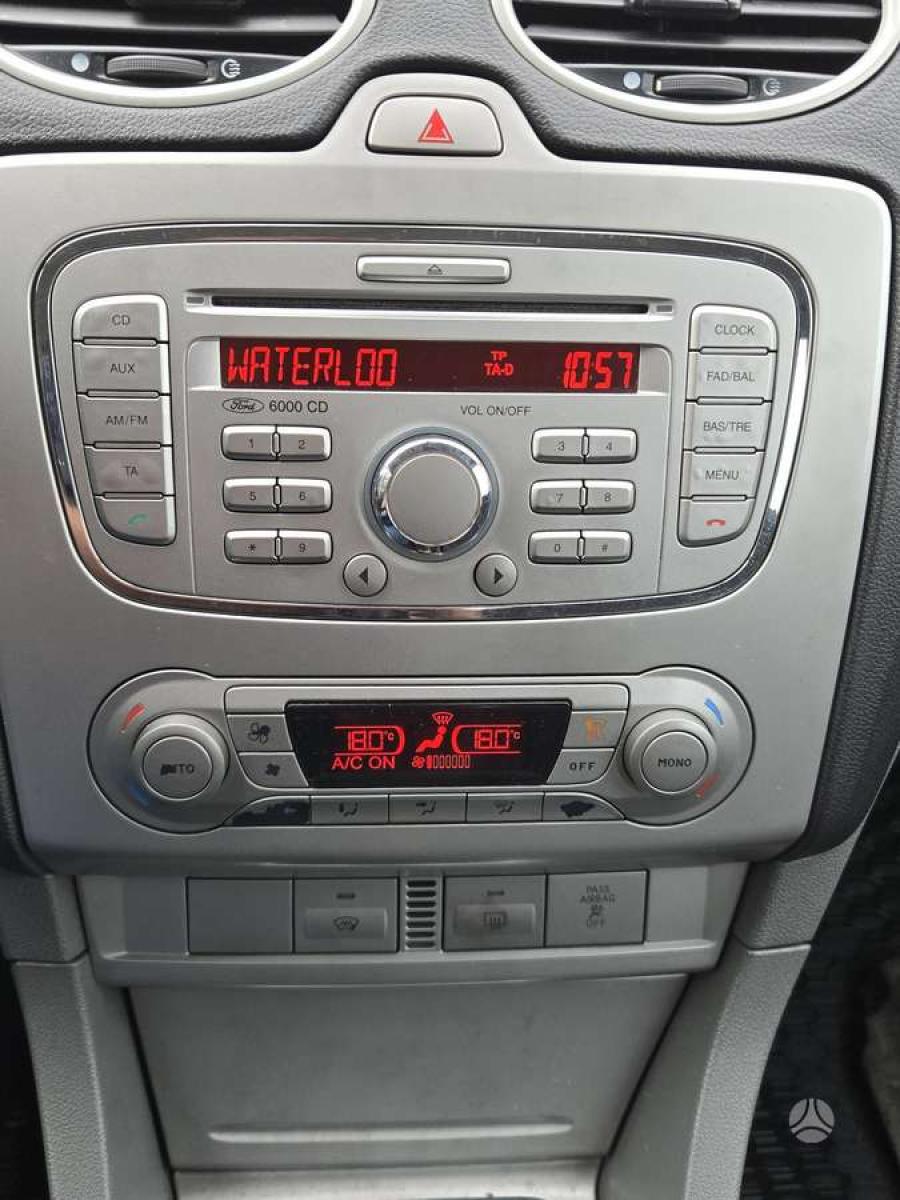 Red Ford Focus 2008 in Vilnius, with an engine capacity of 1.56 L and mileage of 325 thousand km for 1299 €, photo 8 on AUTOMOTO.COM.LV