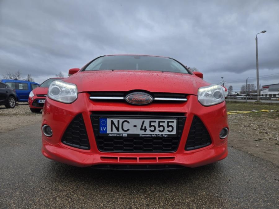 Red Ford Focus 2013 in Riga, with an engine capacity of 2.00 L and mileage of 328 thousand km for 4750 €, photo 20 on AUTOMOTO.COM.LV