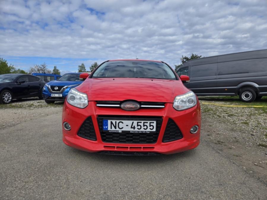 Red Ford Focus 2013 in Riga, with an engine capacity of 2.00 L and mileage of 328 thousand km for 4750 €, photo 21 on AUTOMOTO.COM.LV