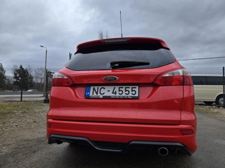 Red Ford Focus 2013 in Riga, with an engine capacity of 2.00 L and mileage of 328 thousand km for 4750 €, photo 27 on AUTOMOTO.COM.LV