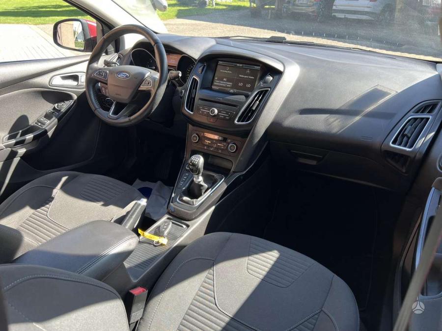 Red Ford Focus 2016 in Taurage, with an engine capacity of 1.50 L and mileage of 240 thousand km for 4650 €, photo 14 on AUTOMOTO.COM.LV