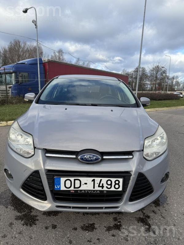 Violet Ford Focus 2012 in Riga, with an engine capacity of 1.60 L and mileage of 242 thousand km for 2650 €, photo 1 on AUTOMOTO.COM.LV