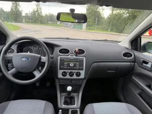 White Ford Focus 2006 in Riga, with an engine capacity of 1.60 L and mileage of 292 thousand km for 1200 €, photo 10 on AUTOMOTO.COM.LV