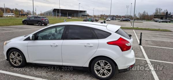 White Ford Focus 2011 in Tartu, with an engine capacity of 1.60 L and mileage of 320 thousand km for 2800 €, photo 6 on AUTOMOTO.COM.LV