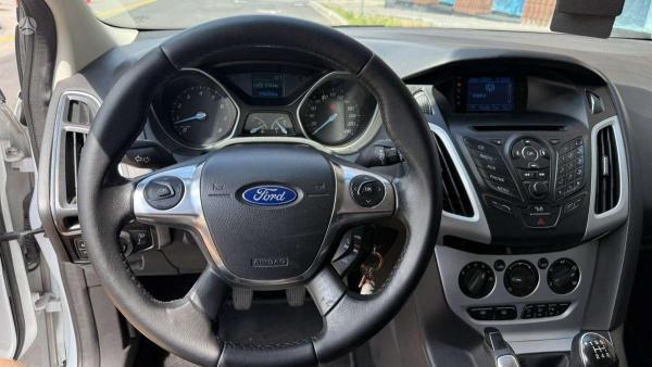 White Ford Focus 2012 in Vilnius, with an engine capacity of 1.00 L and mileage of 300 thousand km for 2750 €, photo 5 on AUTOMOTO.COM.LV