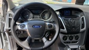 White Ford Focus 2012 in Vilnius, with an engine capacity of 1.00 L and mileage of 300 thousand km for 2750 €, photo 6 on AUTOMOTO.COM.LV