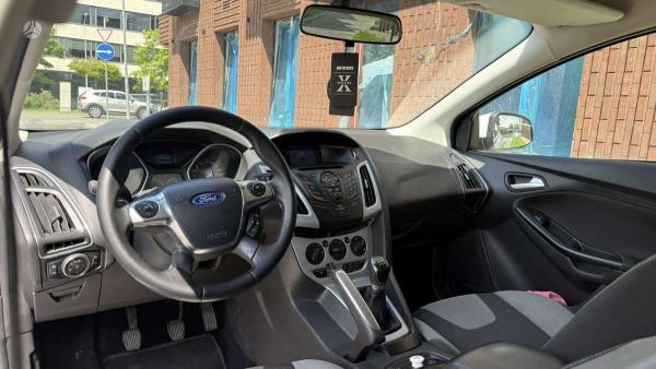 White Ford Focus 2012 in Vilnius, with an engine capacity of 1.00 L and mileage of 300 thousand km for 2750 €, photo 10 on AUTOMOTO.COM.LV
