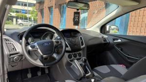 White Ford Focus 2012 in Vilnius, with an engine capacity of 1.00 L and mileage of 300 thousand km for 2750 €, photo 11 on AUTOMOTO.COM.LV