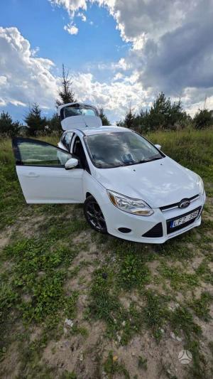 White Ford Focus 2013 in Vilnius, with an engine capacity of 2.00 L and mileage of 192 thousand km for 2900 €, photo  on AUTOMOTO.COM.LV