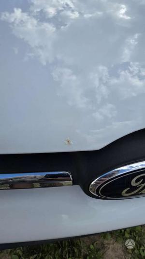 White Ford Focus 2013 in Vilnius, with an engine capacity of 2.00 L and mileage of 192 thousand km for 2900 €, photo 10 on AUTOMOTO.COM.LV