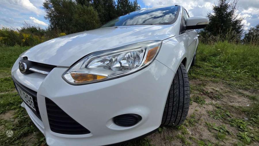 White Ford Focus 2013 in Vilnius, with an engine capacity of 2.00 L and mileage of 192 thousand km for 2900 €, photo 15 on AUTOMOTO.COM.LV