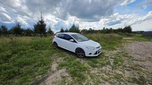 White Ford Focus 2013 in Vilnius, with an engine capacity of 2.00 L and mileage of 192 thousand km for 2900 €, photo 16 on AUTOMOTO.COM.LV