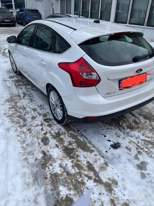 White Ford Focus 2014 in Vilnius, with an engine capacity of 2.00 L and mileage of 140 thousand km for 4300 €, photo 4 on AUTOMOTO.COM.LV