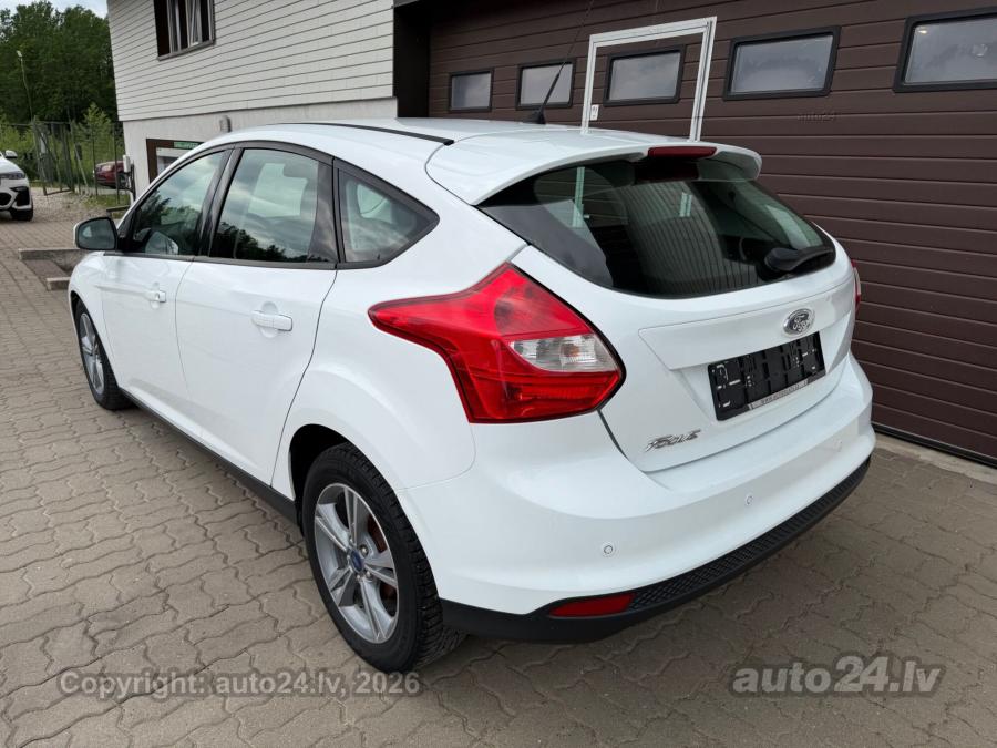 White Ford Focus 2014 in Voru, with an engine capacity of 1.60 L and mileage of 254 thousand km for 4390 €, photo 4 on AUTOMOTO.COM.LV