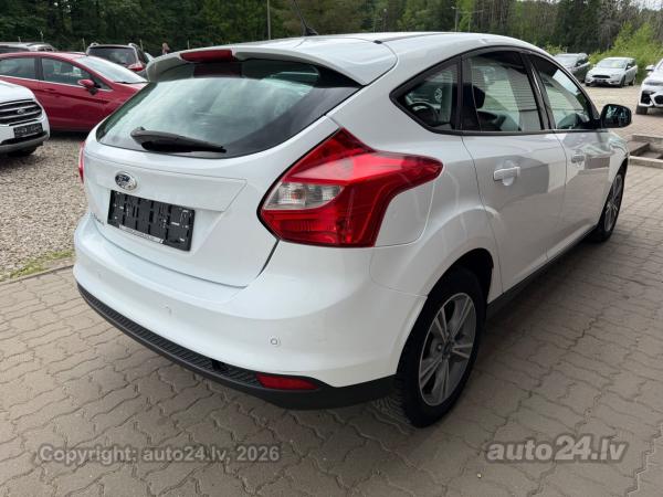 White Ford Focus 2014 in Voru, with an engine capacity of 1.60 L and mileage of 254 thousand km for 4390 €, photo 4 on AUTOMOTO.COM.LV